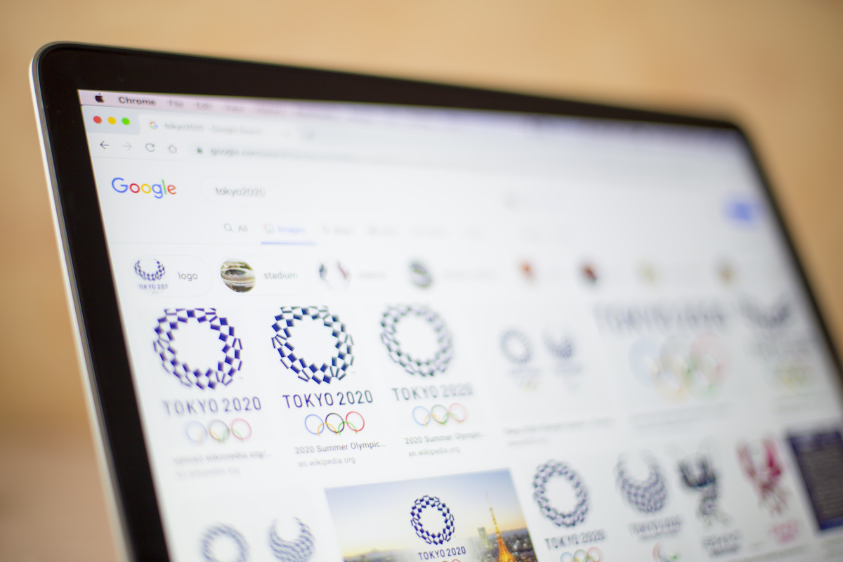 2020 Summer Olympics images on computer screen - Running with Miles